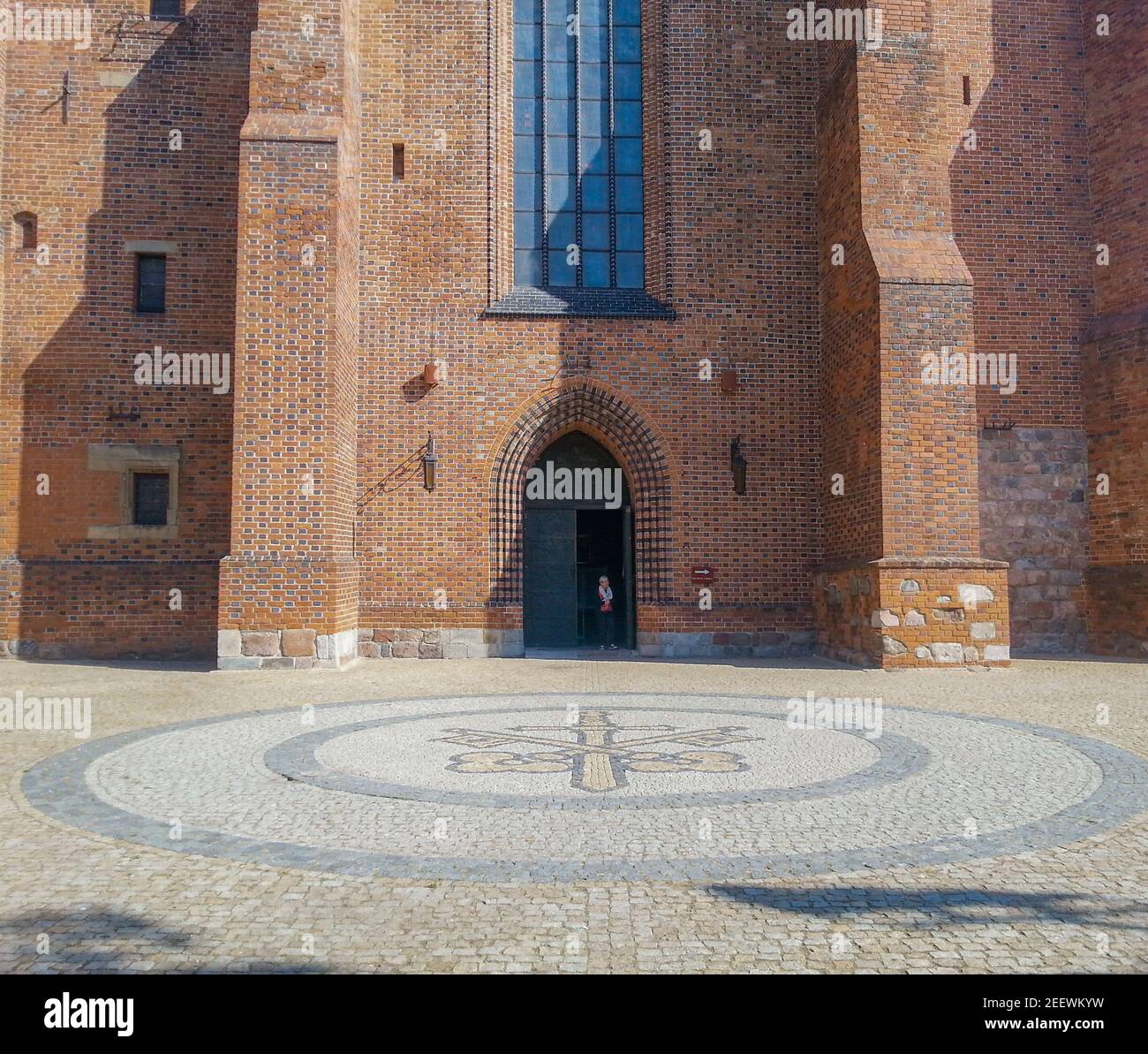 Entrance to huge brick cathedral Stock Photo - Alamy