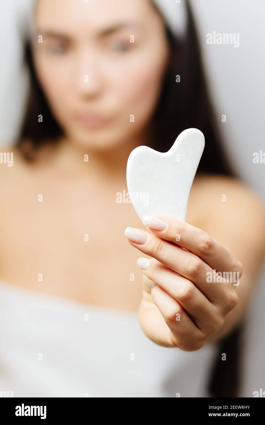 Using gua sha hi-res stock photography and images - Alamy