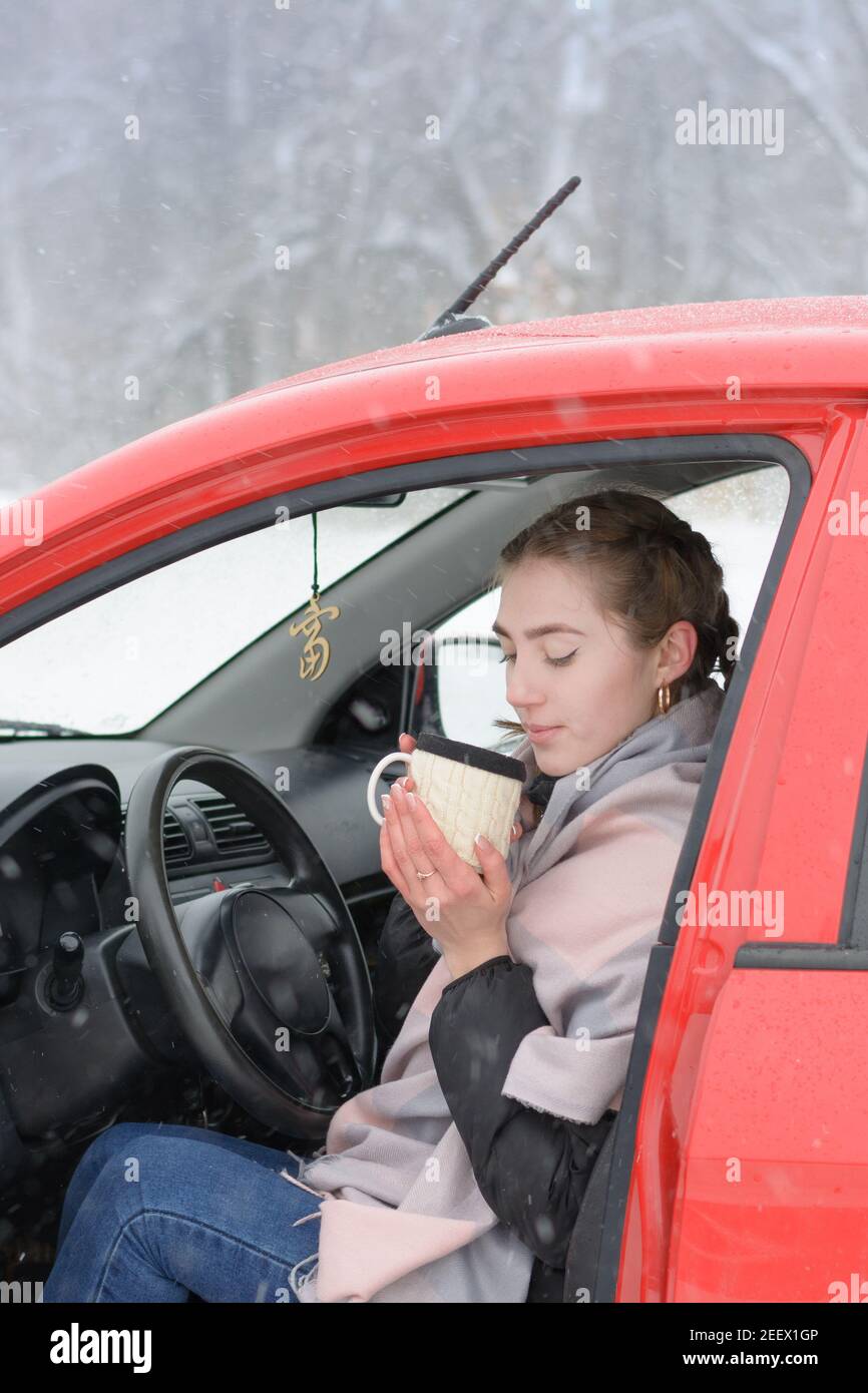 Red car driver hi-res stock photography and images - Alamy