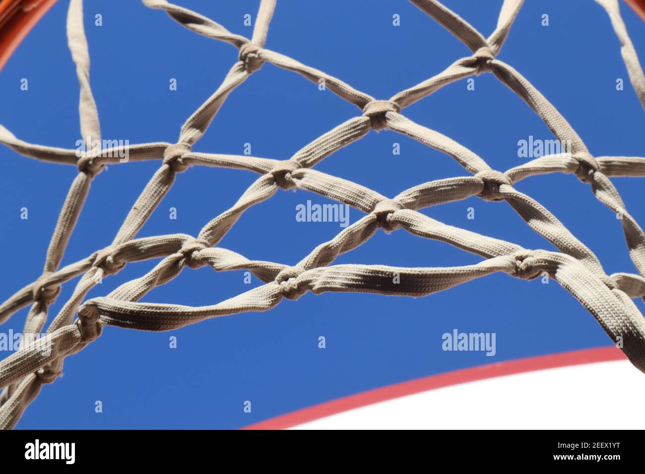 Closeup shot of a basketball net against a blue sky Stock Photo - Alamy