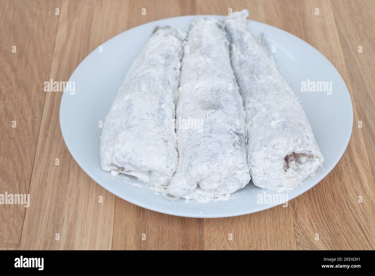 In the process of cooking fish - pressed with flour Stock Photo - Alamy