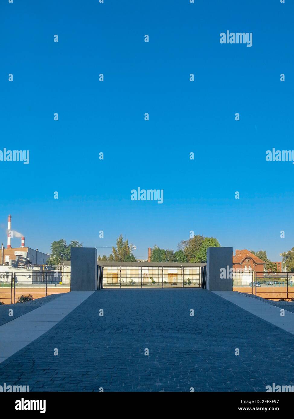 Central bottom look to wooden platform over Odra River with pavement in ...