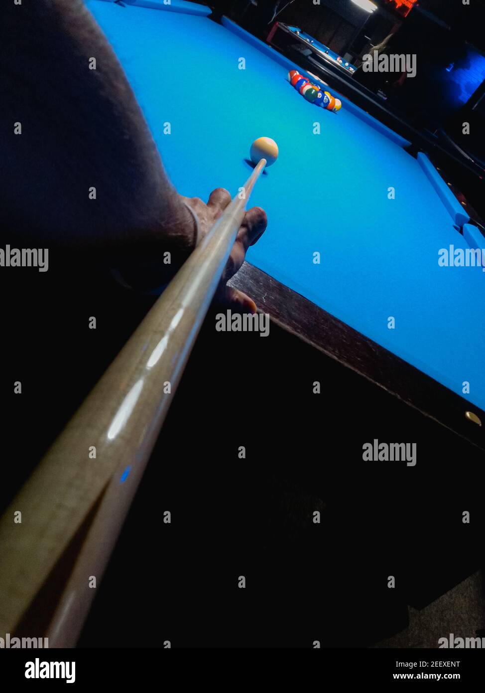 Before shot to billiard-ball at blue billiard table Stock Photo - Alamy