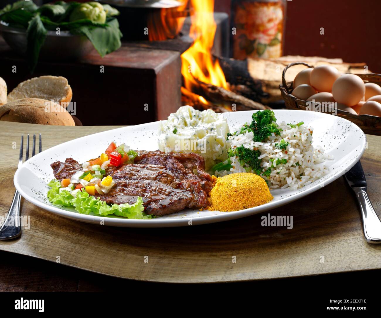 Rice with potatoes and meat Stock Photo - Alamy