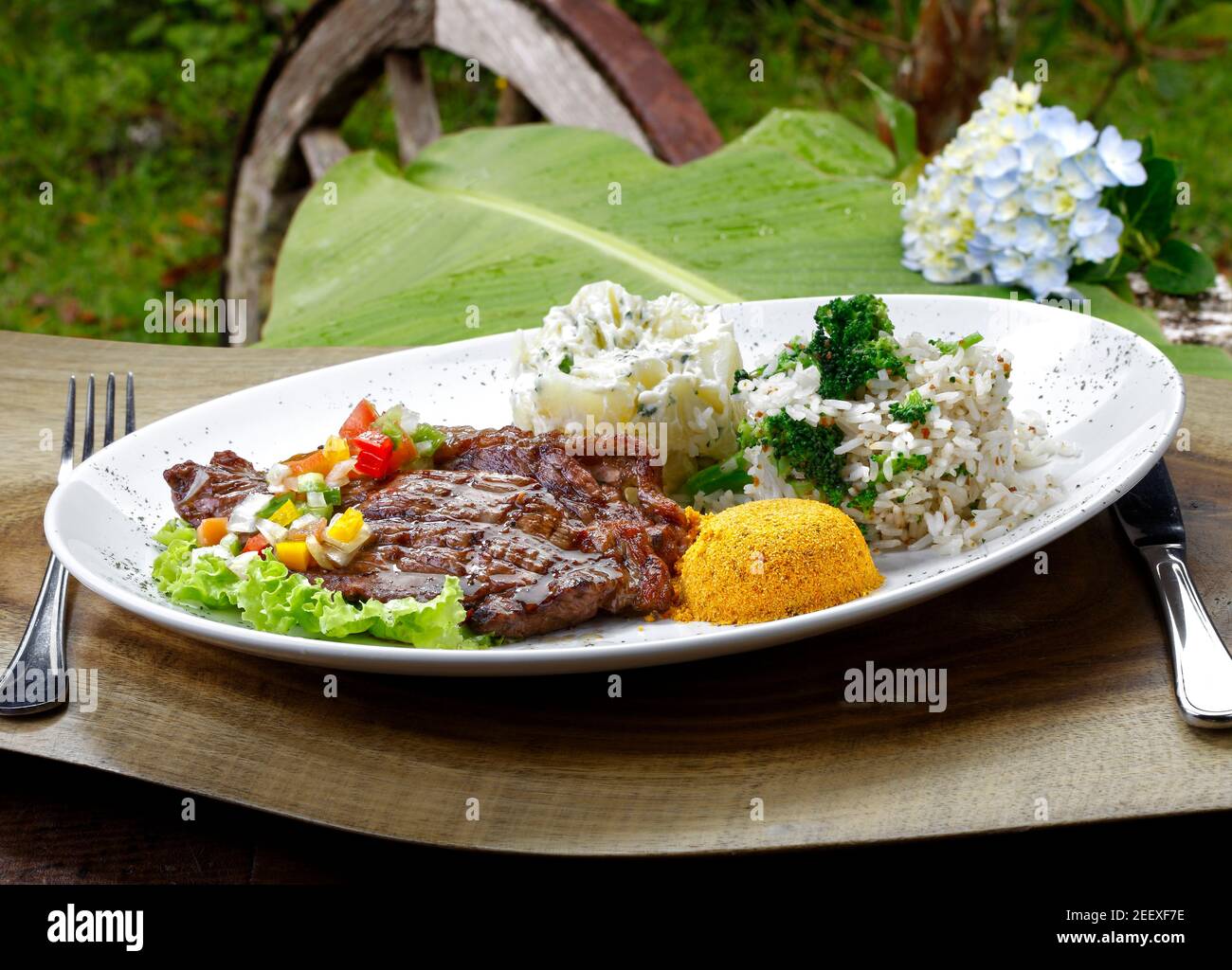 Rice with potatoes and meat Stock Photo - Alamy
