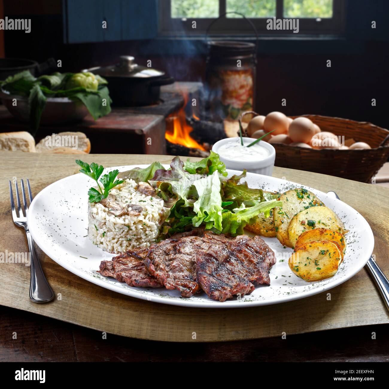 Rice with potatoes and meat Stock Photo - Alamy