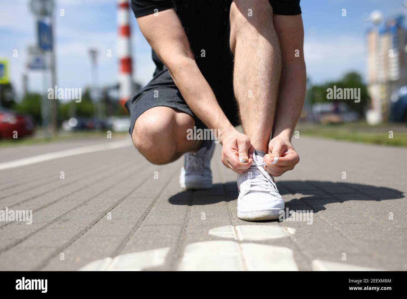Guy walking in city Stock Photo - Alamy