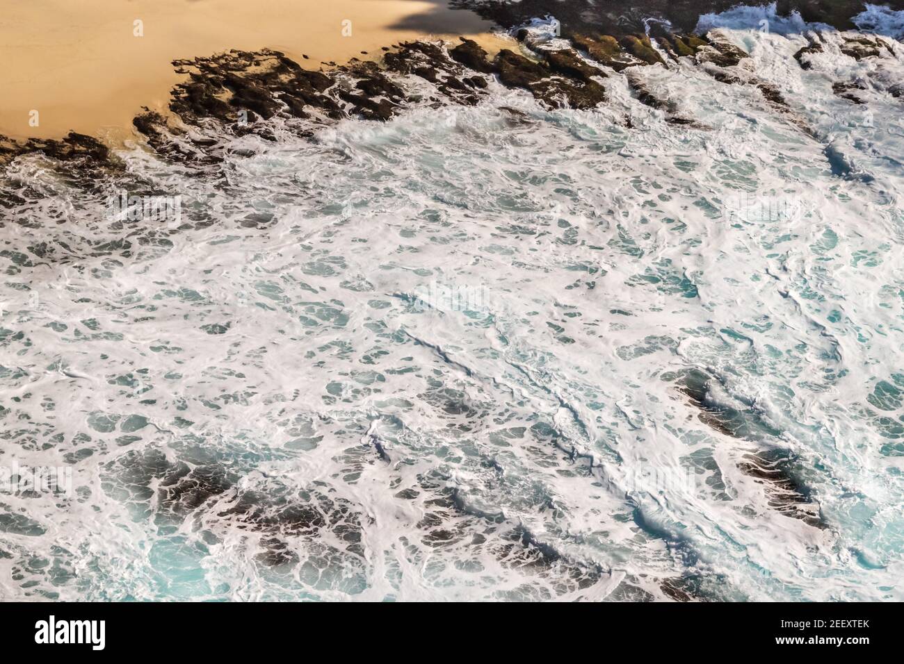 Foaming wave gently sliding into shore at Broken Beach, Nusa Penida ...