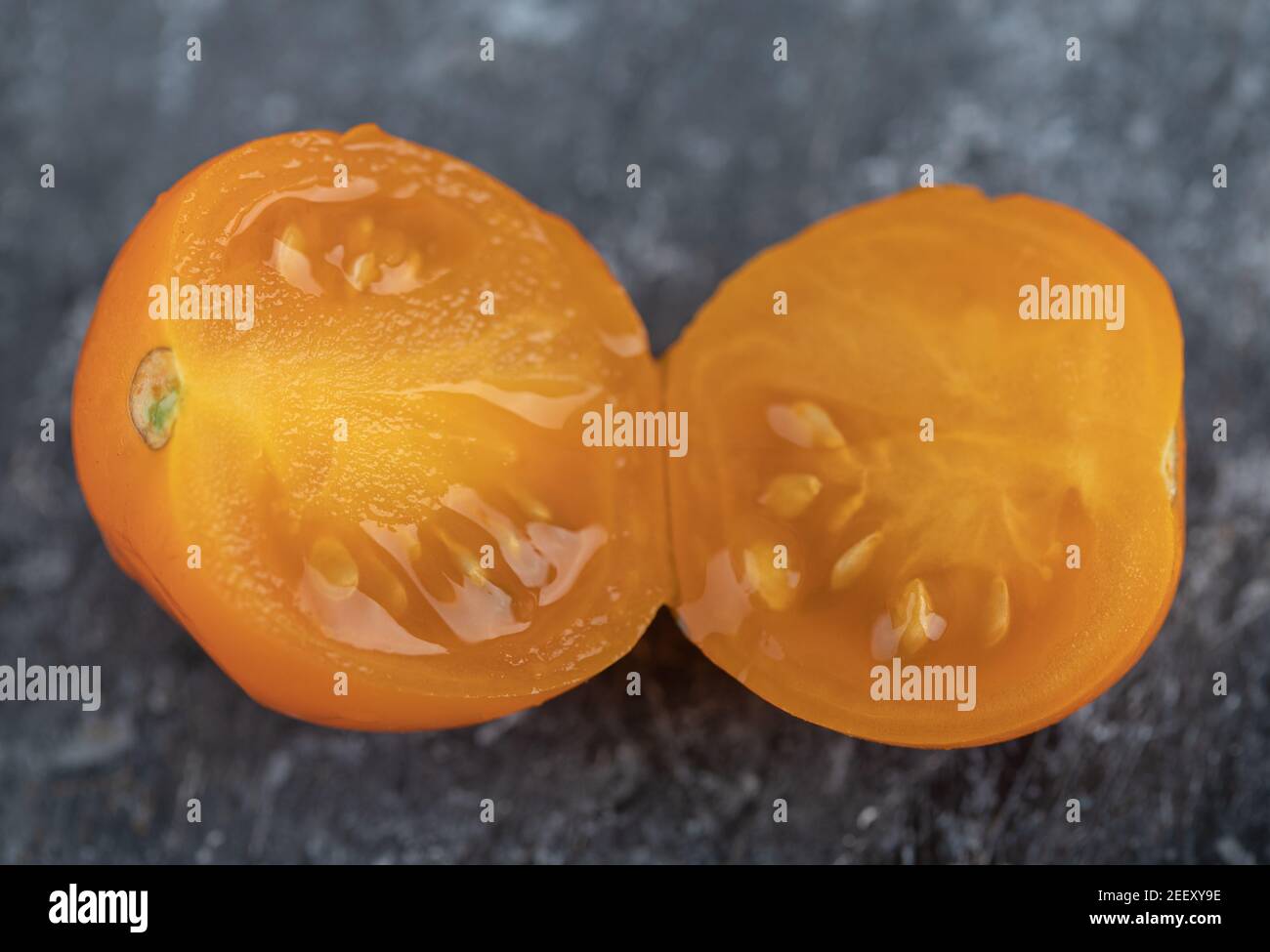 Cherry tomato slice hi-res stock photography and images - Alamy