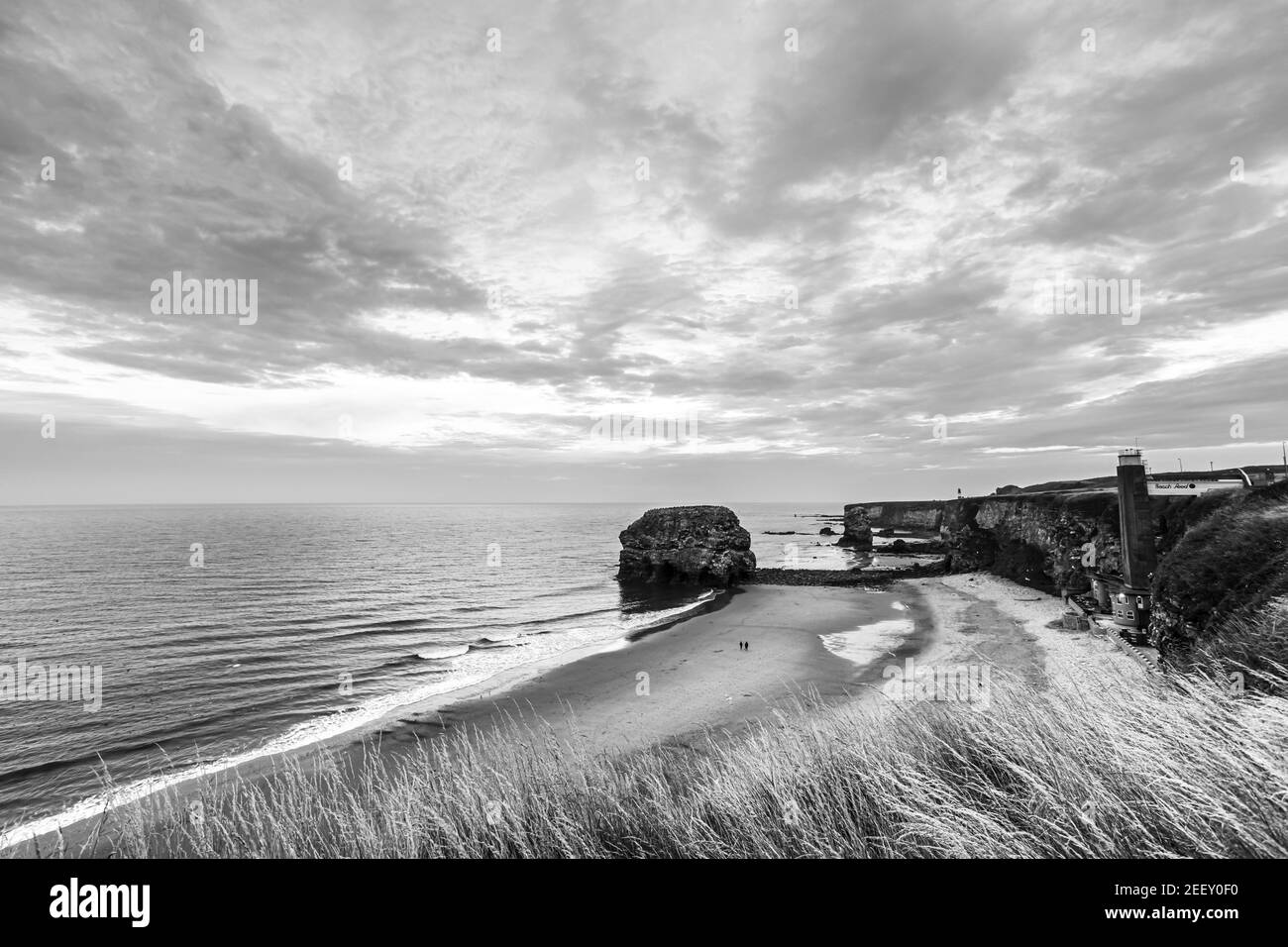 Coastal view of Marsden rock and Grotto South Shields at dusk in black ...