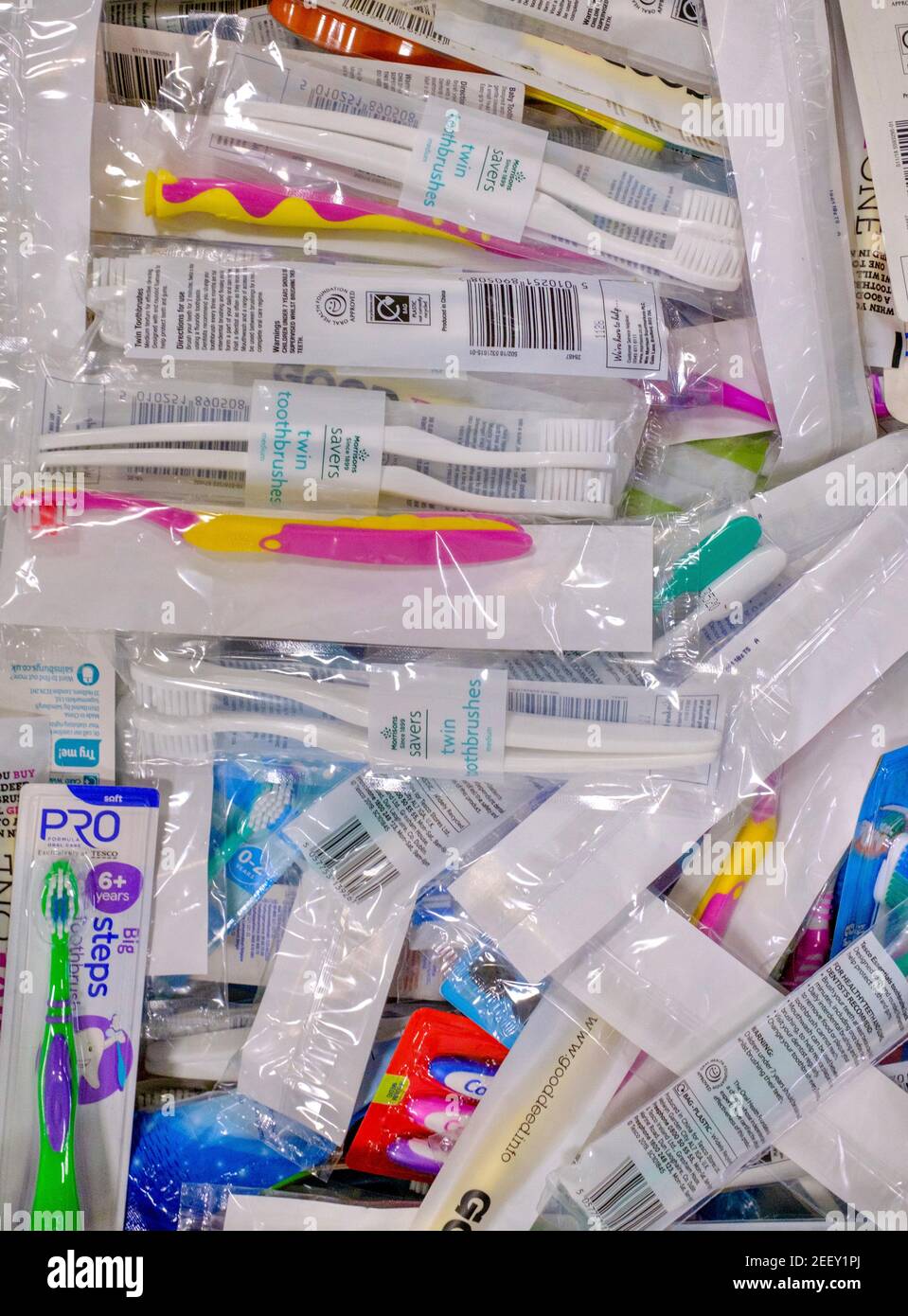 A crate of toothbrushes in plastic packaging donated to a Trussell ...