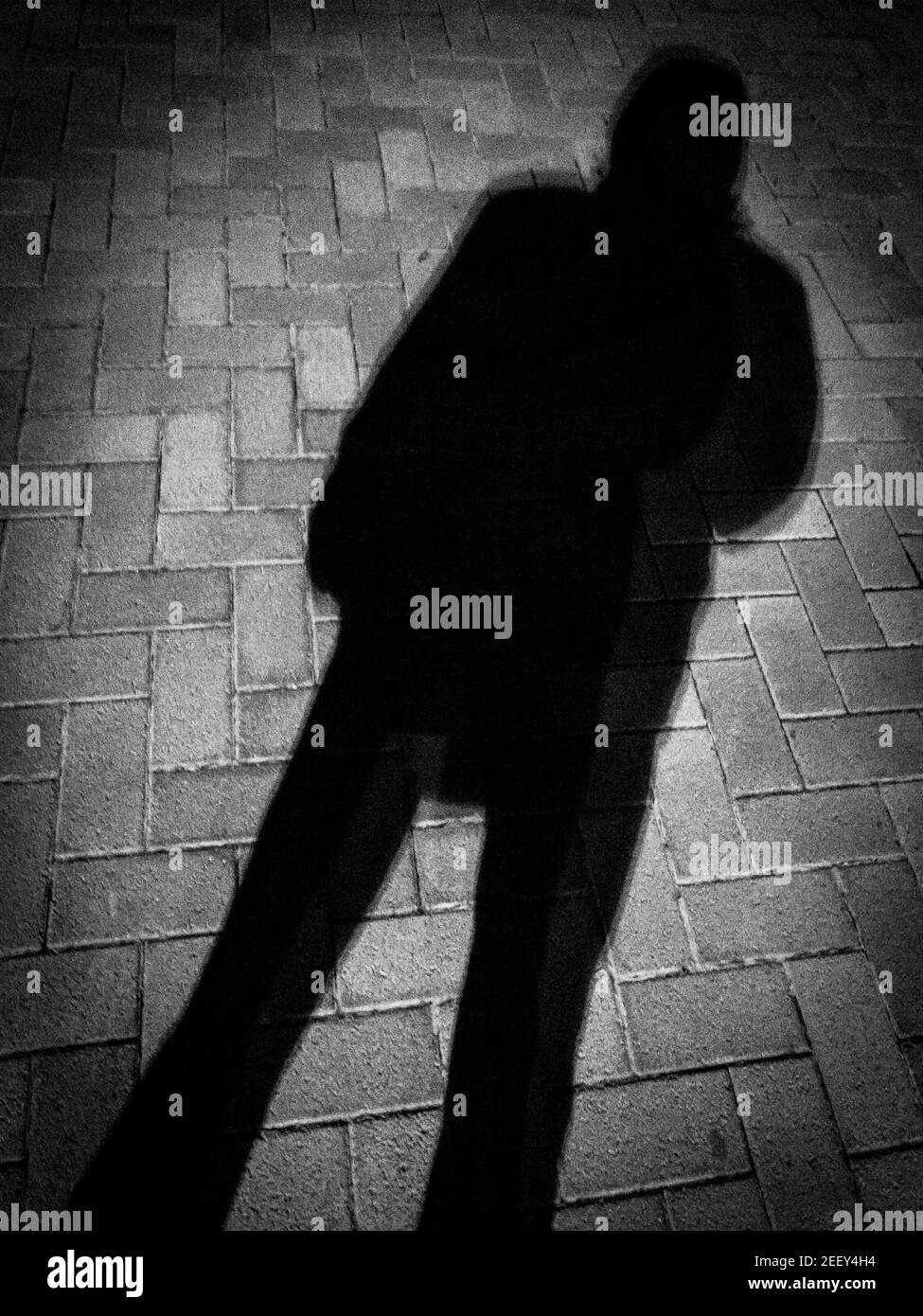Mysterious man shadow hi-res stock photography and images - Alamy