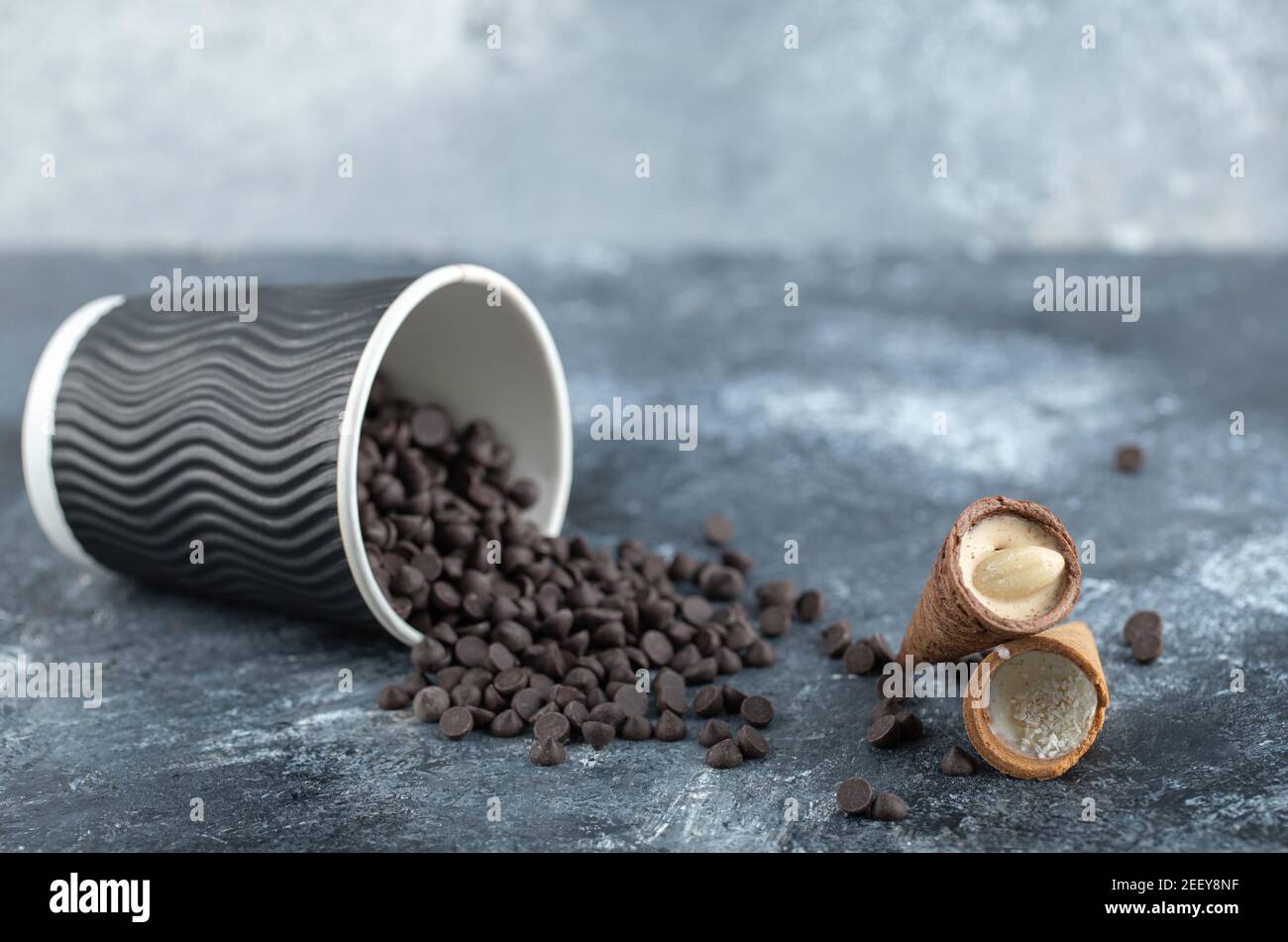 Cup of sweet small chocolate with candy Stock Photo - Alamy