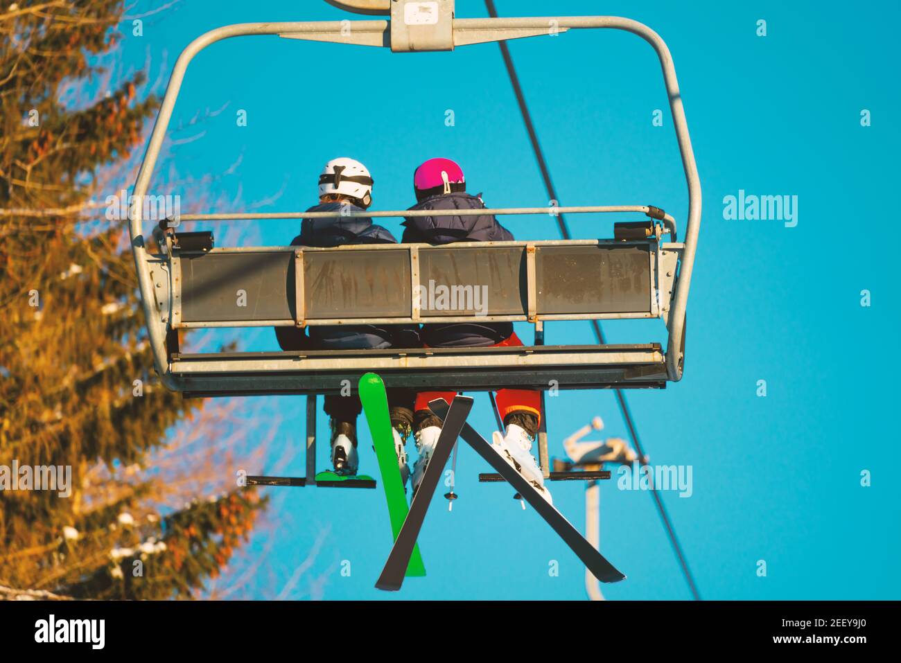 Two people on chair lift hi-res stock photography and images - Alamy