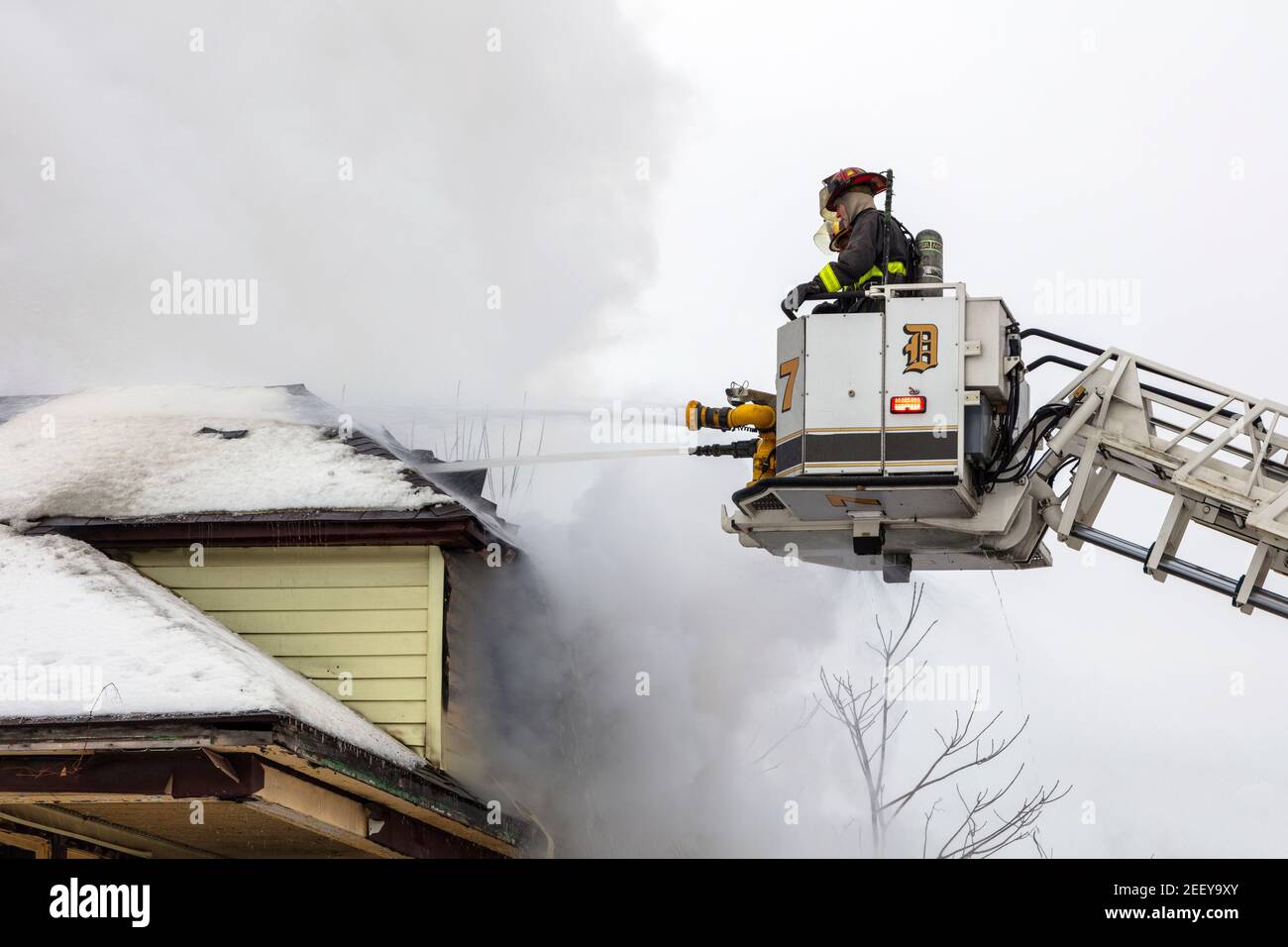 Firefighters in Tower Ladder 7 fighting fire, Detroit, Michigan, USA ...