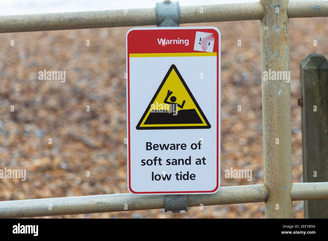 Warning sign, beware of soft sand at low tide, bexhill, east sussex, uk ...