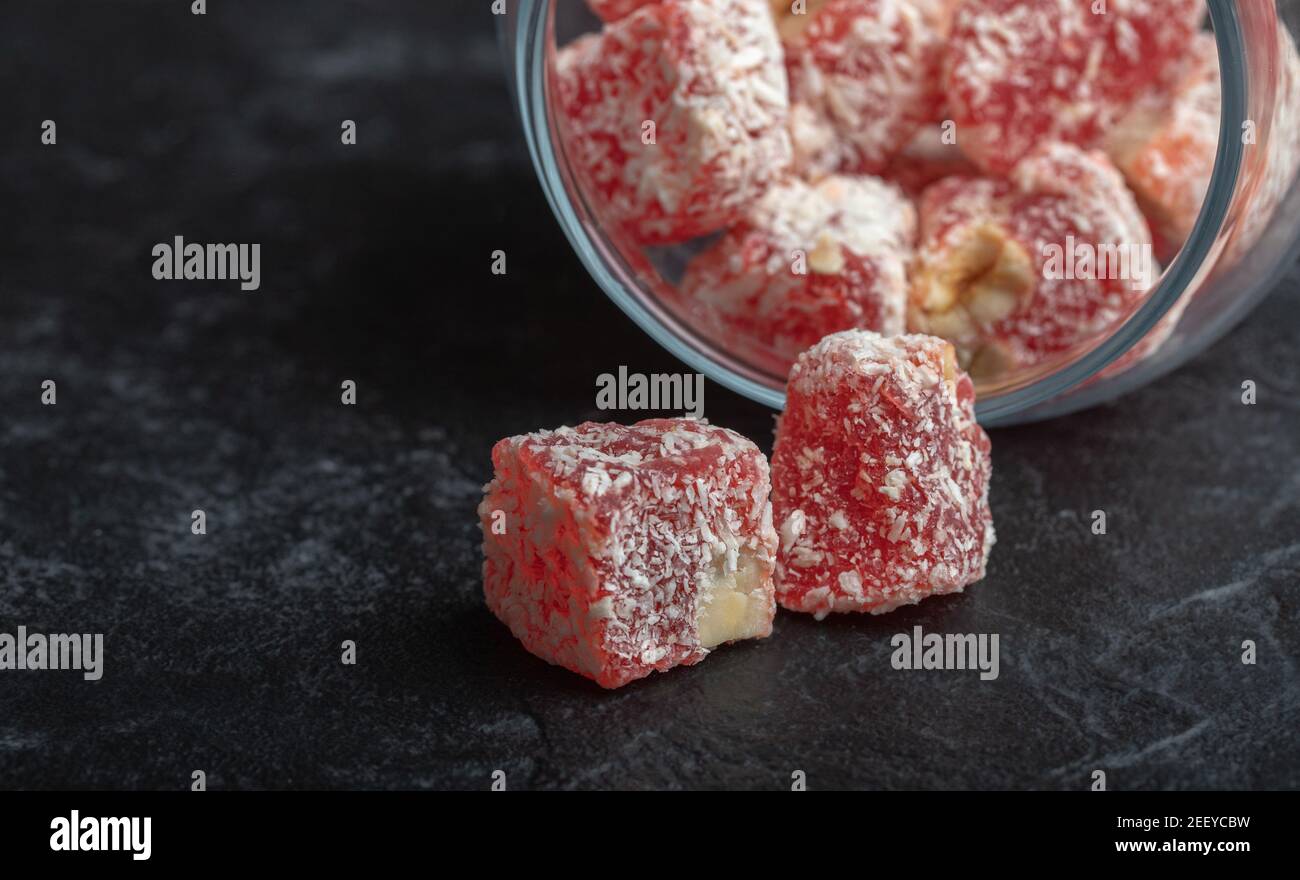 Close up photo of Turkish lokum on black background Stock Photo - Alamy