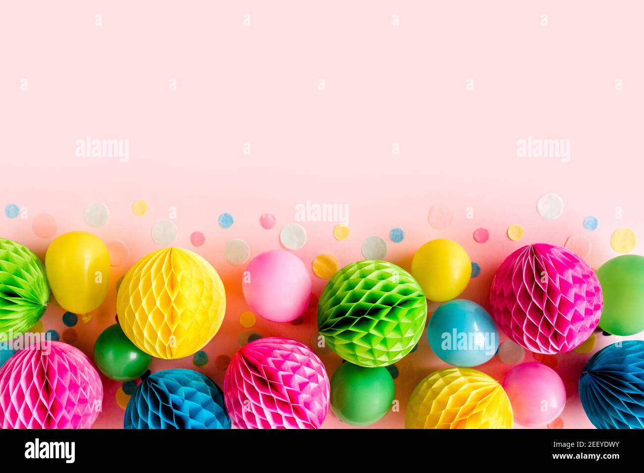 Balloons and confetti on pink background. Birthday, holiday concept ...