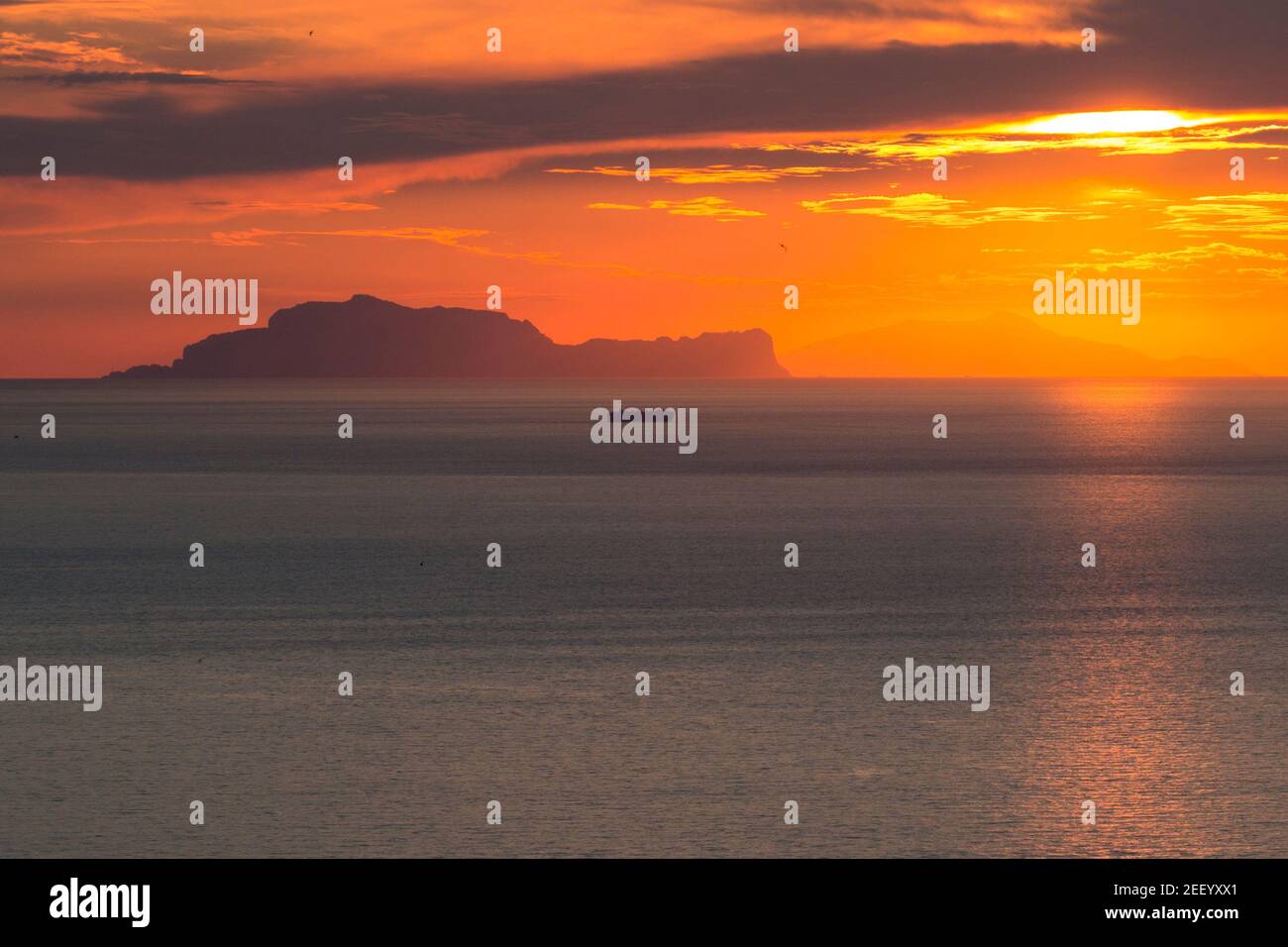 a sunset between Capri and the Amalfi coast Stock Photo - Alamy