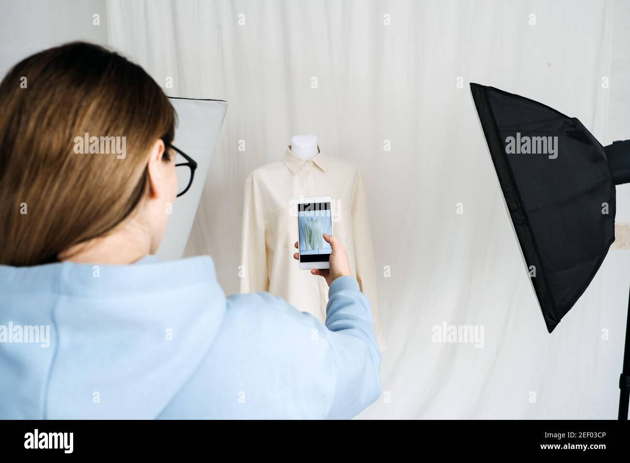 AR VR Technology in Fashion Industry. Female designer shotting clothes ...