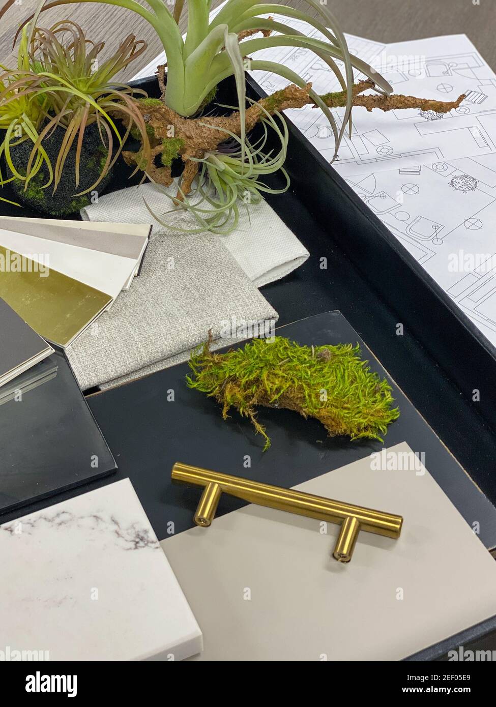 Interior designer's working table, a color palette, furniture and ...