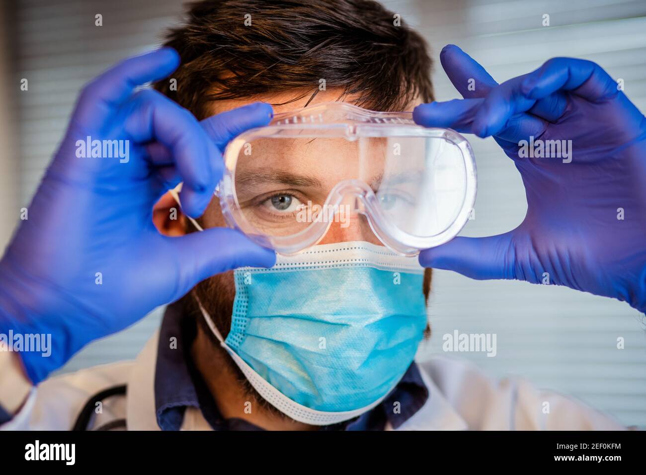 Germ protection suit hi-res stock photography and images - Alamy