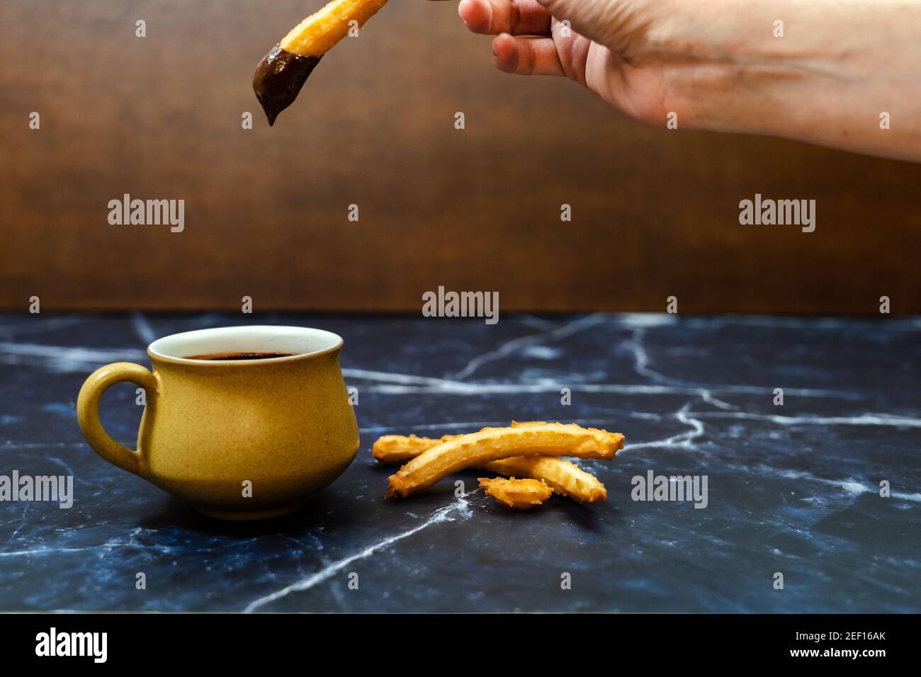 Churro with chocolate hi-res stock photography and images - Alamy
