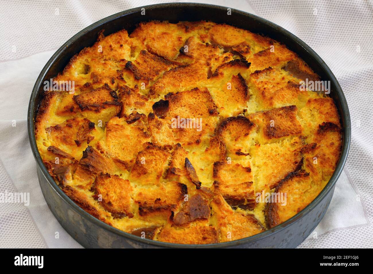 Dish of challah bread pudding Stock Photo - Alamy