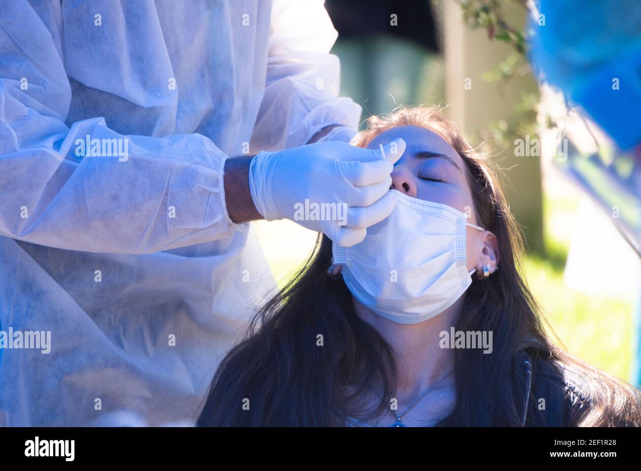 People undergo a free PCR test to detect if they have covid in Bogota ...