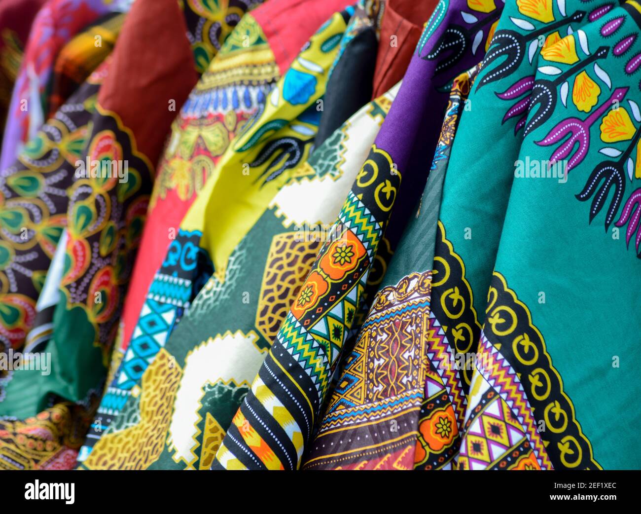 Bright colorful cloth patterns at a street fair Stock Photo - Alamy