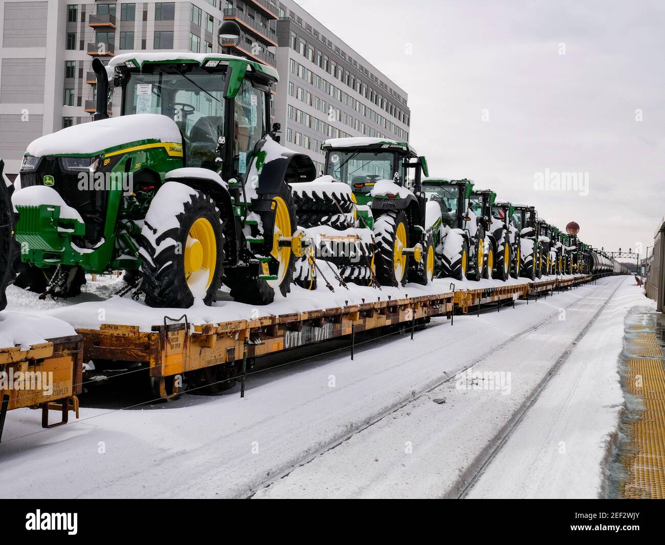 Railroad flatcars loaded with John Deere tractors. Oak Park, Illinois Stock Photo - Alamy