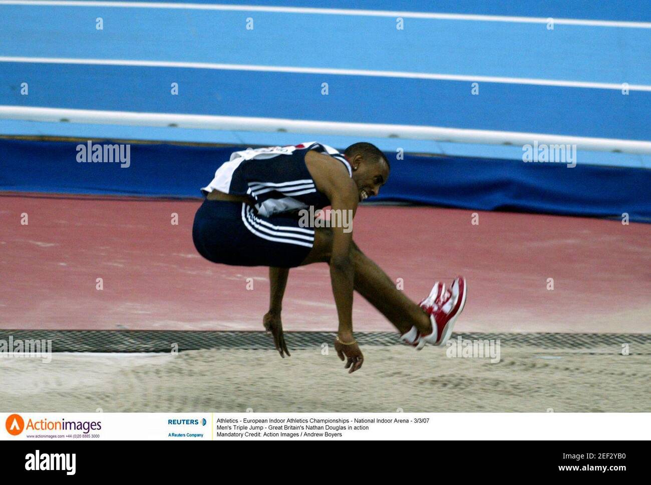 Great britains nathan douglas in action in the triple jump hi-res stock ...