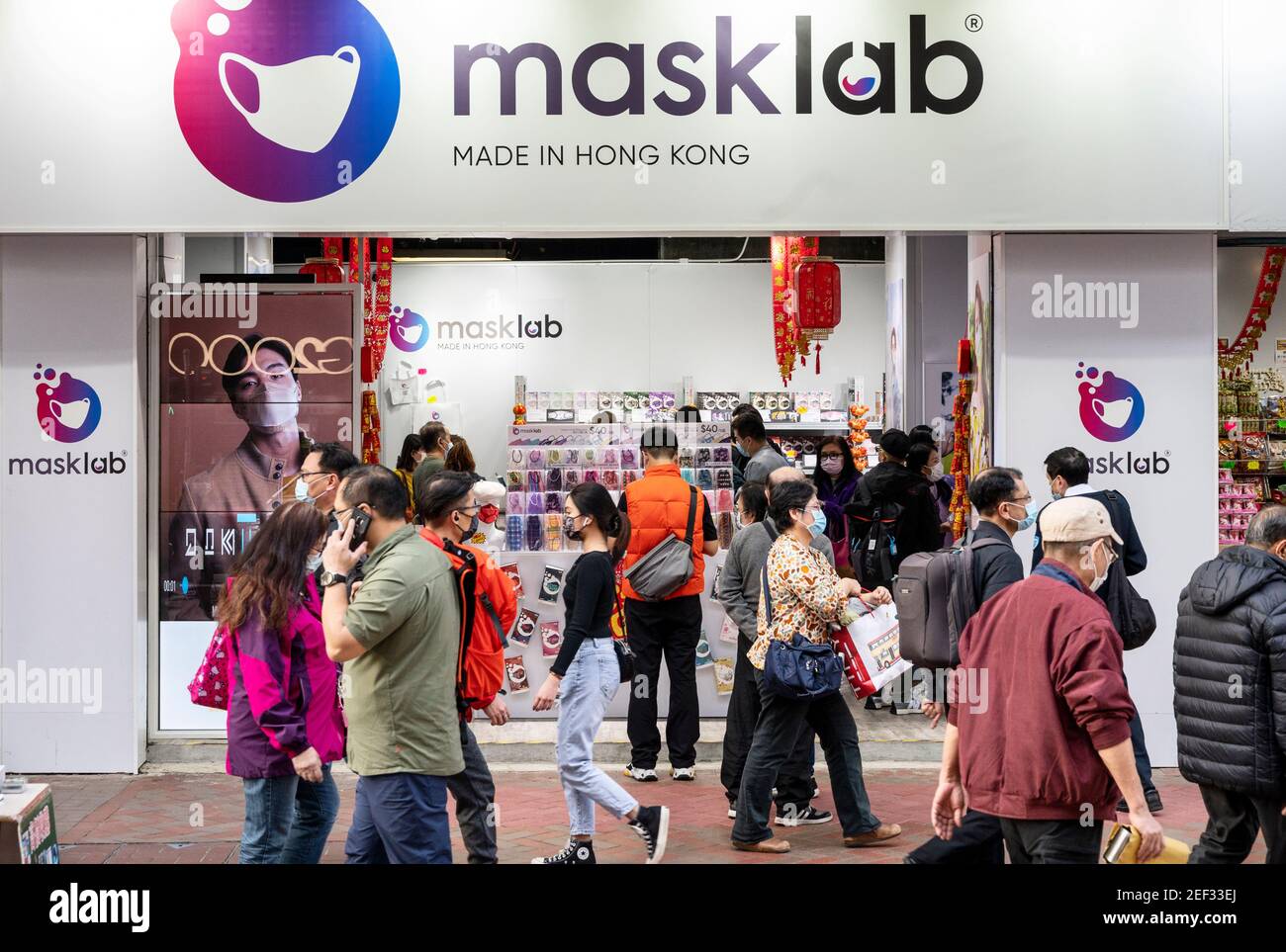 People seen at the hygiene face mask brand Masklab store in Hong Kong. (Photo by Budrul Chukrut ...