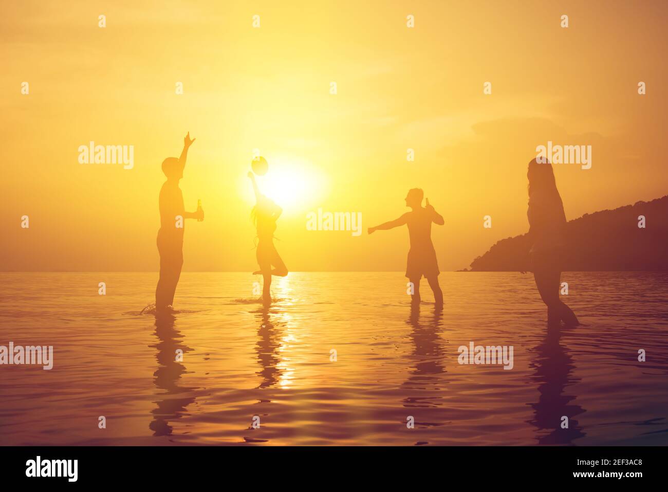 Group in playing sea beach hi-res stock photography and images - Alamy