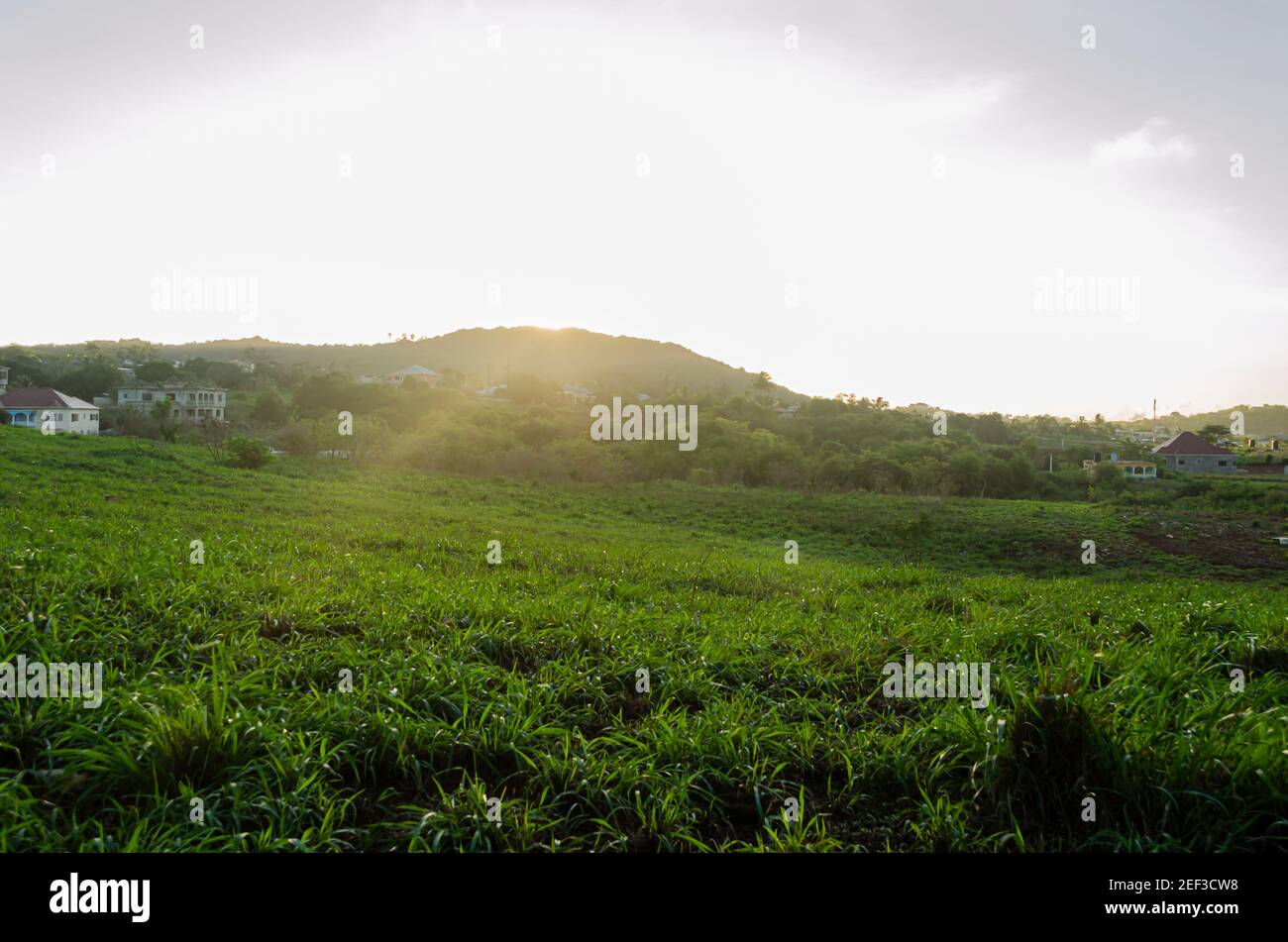 Sun Rising Over The Mountain Stock Photo - Alamy