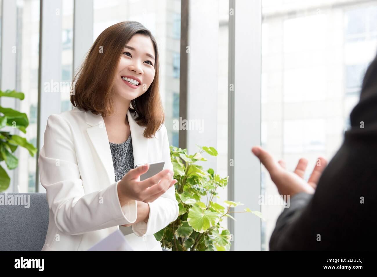 Asian woman in business suit hi-res stock photography and images - Alamy