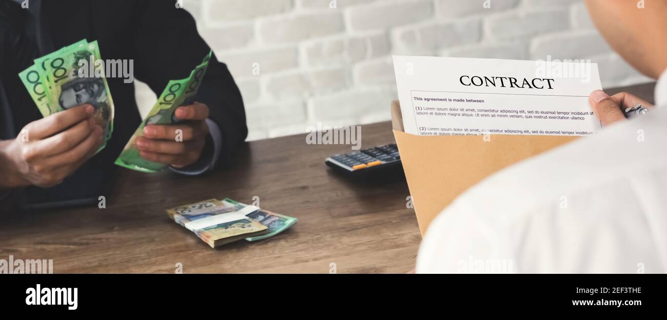 Business partner making contract - loan, bribery and corruption ...