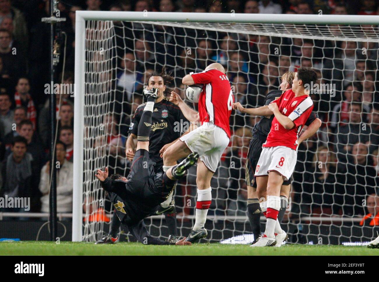 Overhead kick blocked hi-res stock photography and images - Alamy