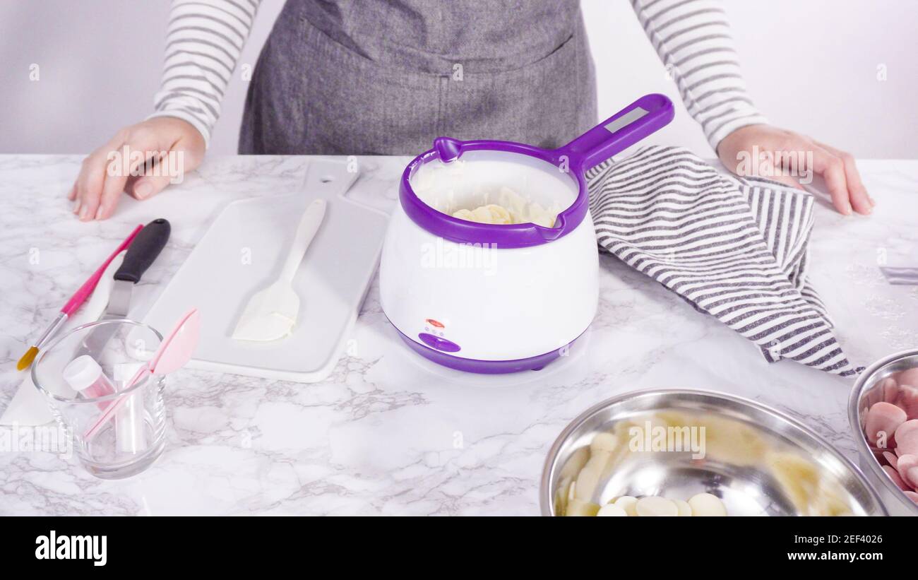 Step by step. Melting chocolate candy melts in an electric candy ...