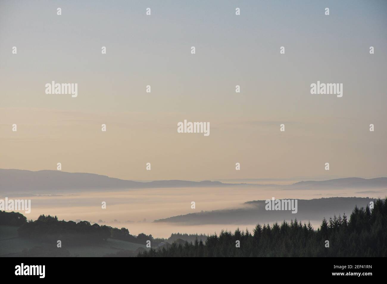 Scenic view on top of a hill with a beautiful sunset sky background ...
