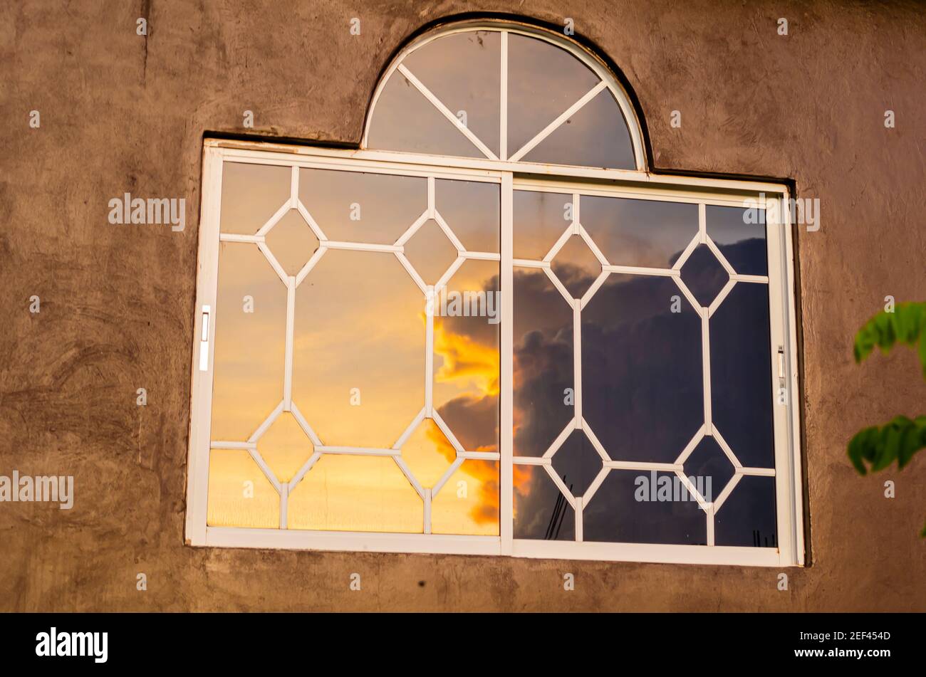 Evening Clouds Reflecting In Window Stock Photo - Alamy