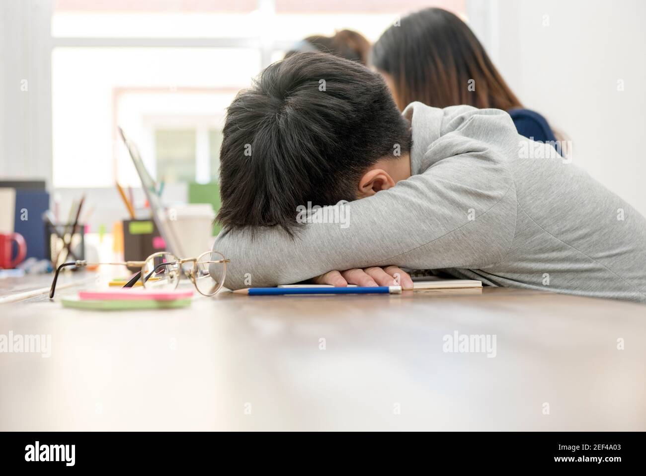 Student sleeping study table hi-res stock photography and images - Alamy
