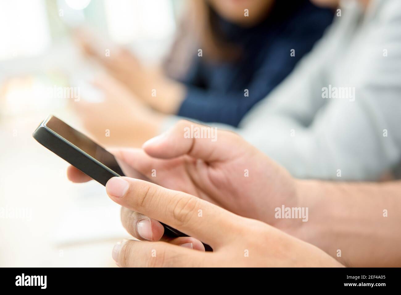 Hands using tablet smartphone social hi-res stock photography and ...