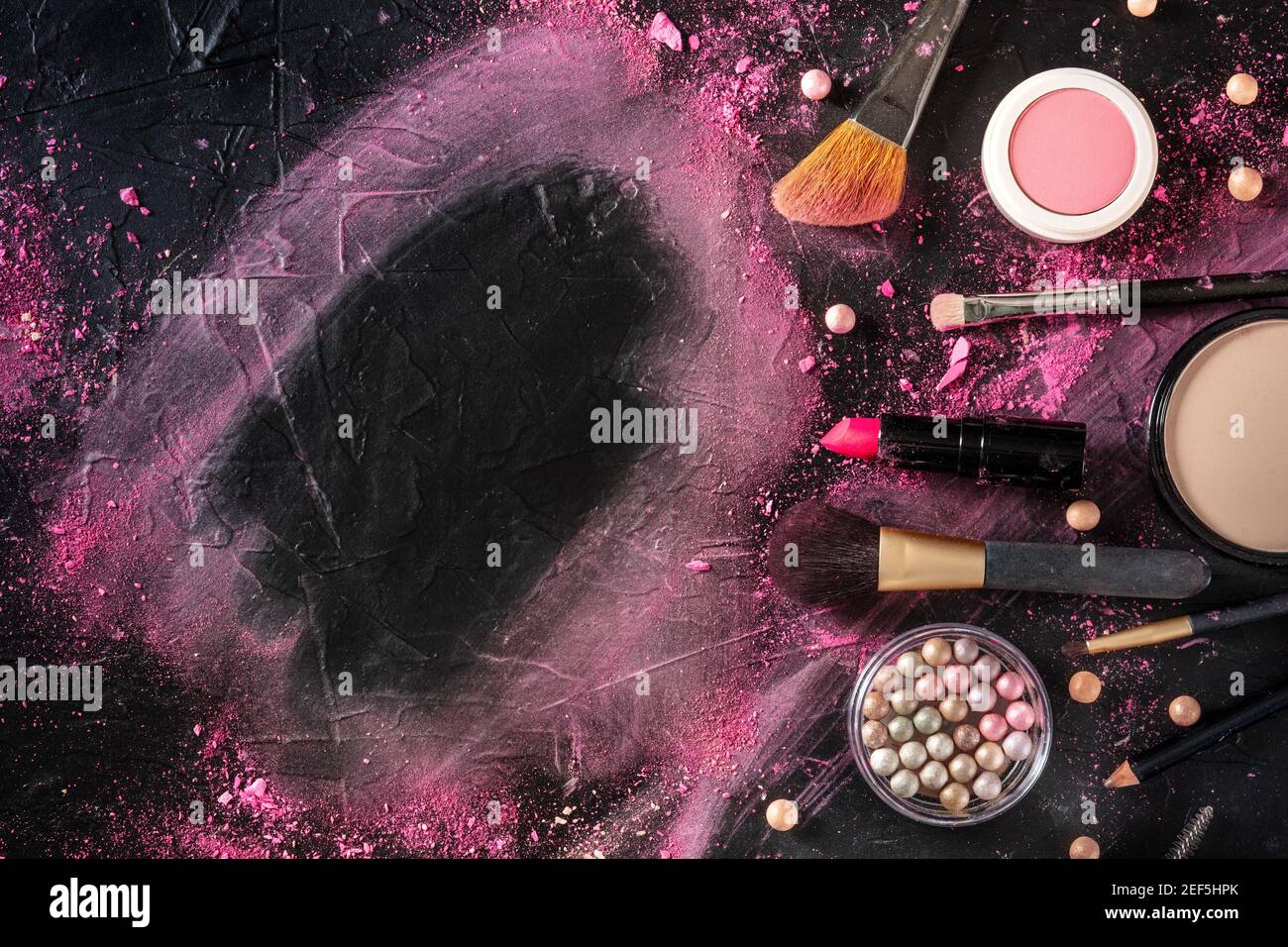 Make-up frame, formed by makeup products and tools and crushed ...