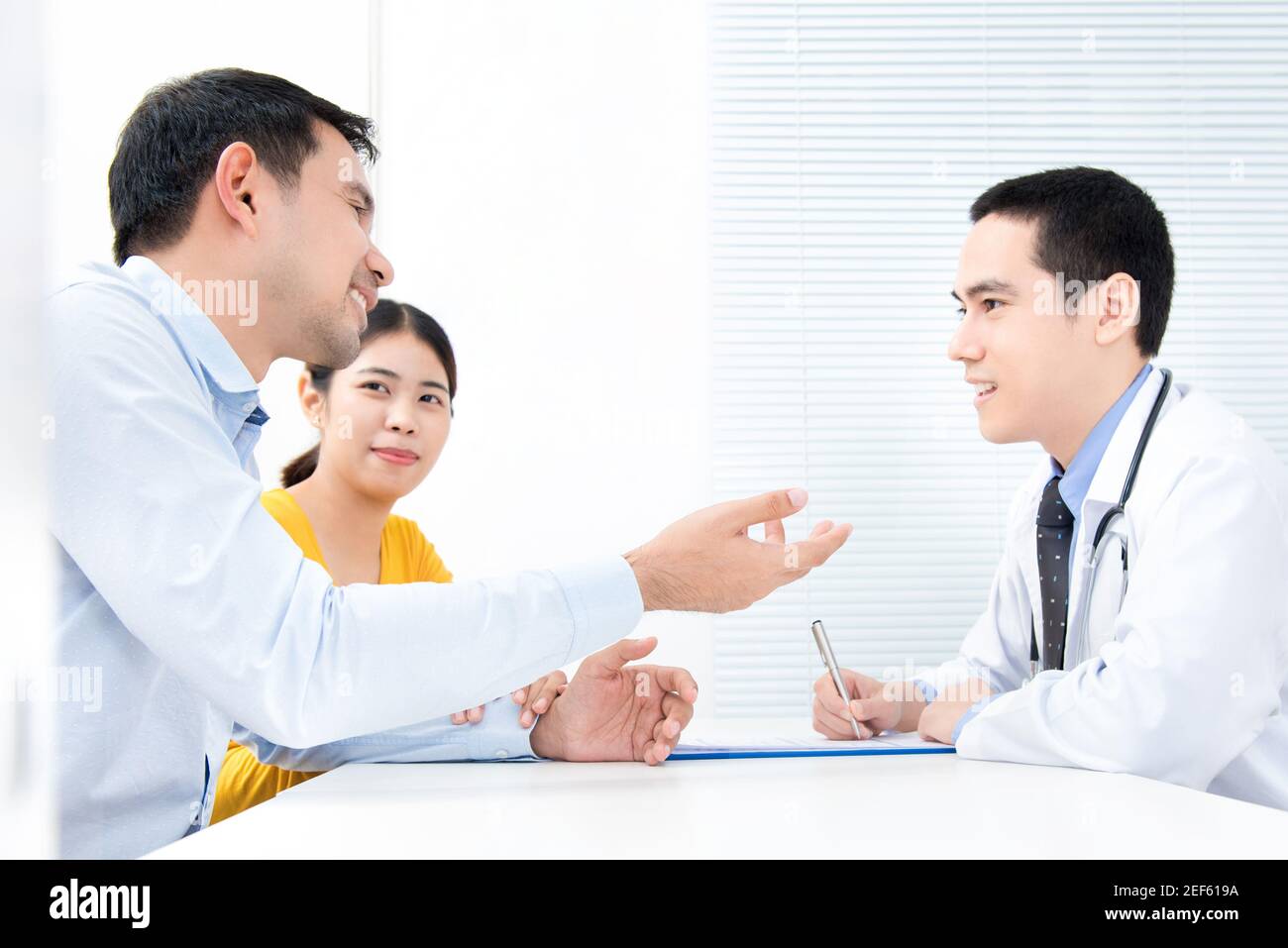 Asian doctor couple consultation hi-res stock photography and images ...