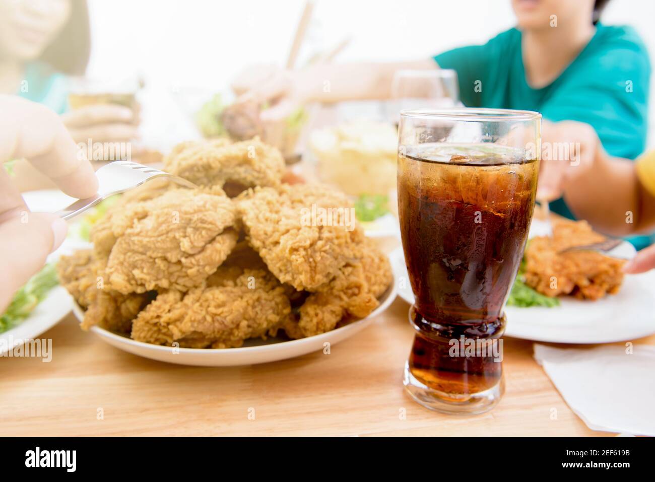 Fried chicken and soft drink on dining table in fast food restaurant ...