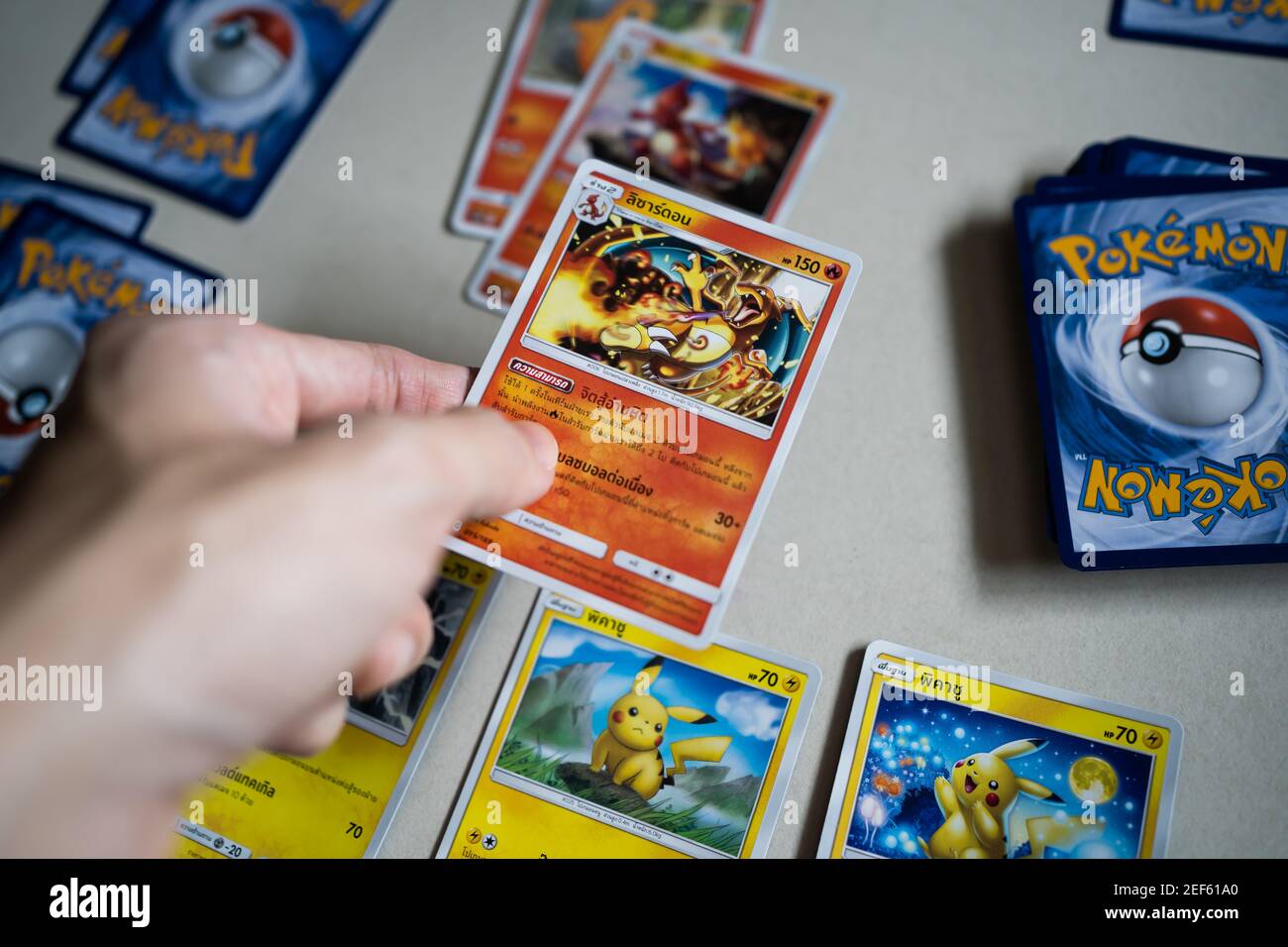 Bangkok, Thailand - January 27, 2021 : A man playing Pokemon Trading ...