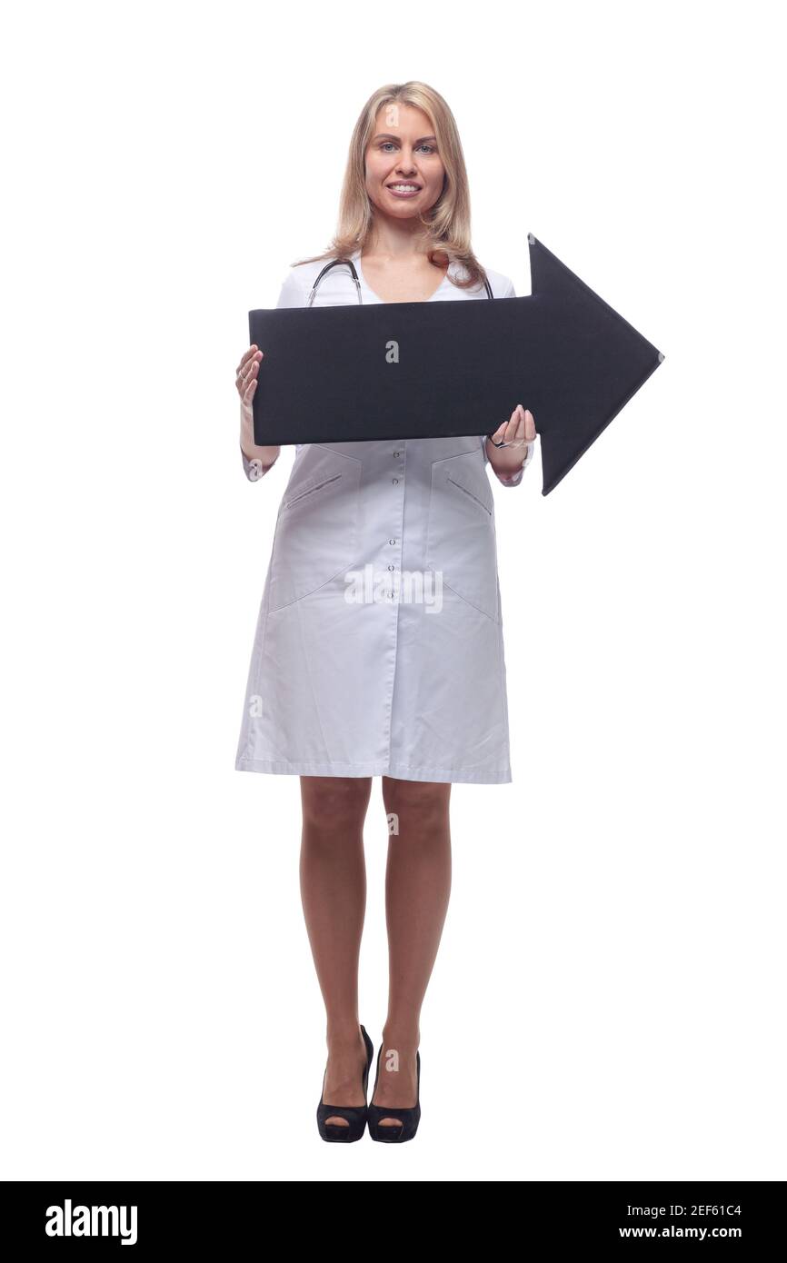 smiling doctor pointing in the right direction . isolated on a white ...