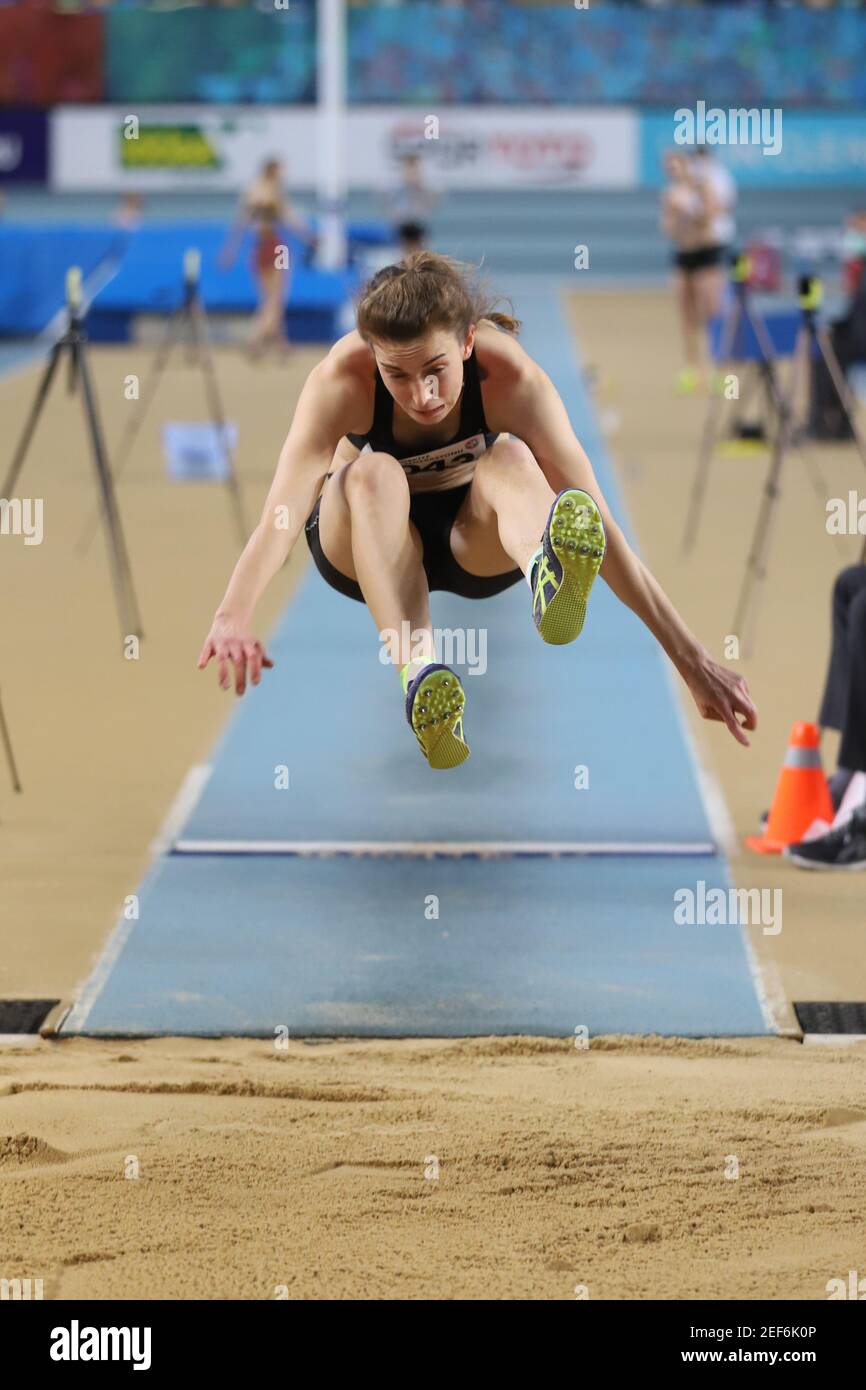 ISTANBUL, TURKEY - FEBRUARY 06, 2021: Undefined athlete long jumping ...