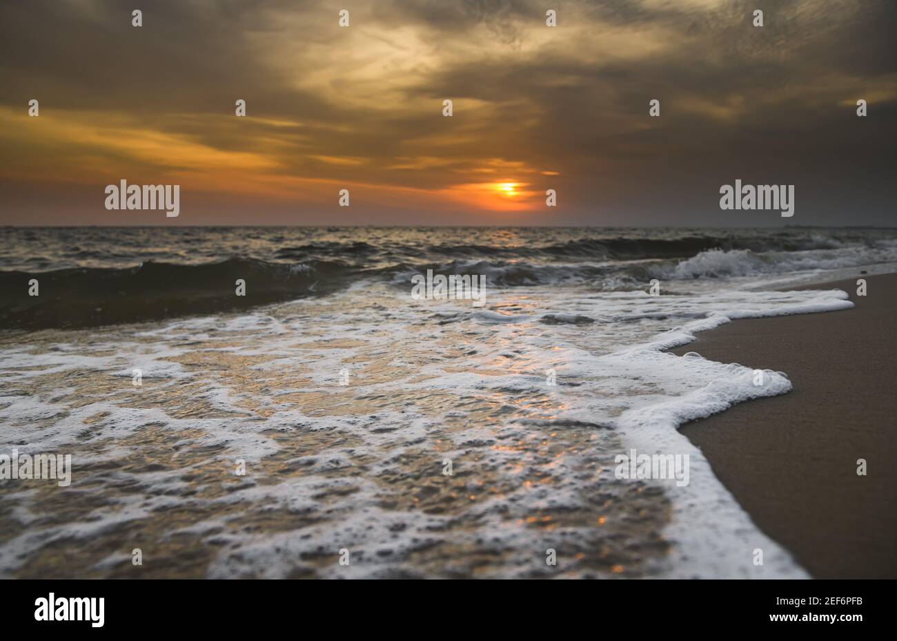 Lanscape of sunset sky beach and sea wave with outdoor low lighting and ...